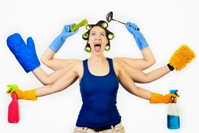 Woman Cooking And Cleaning